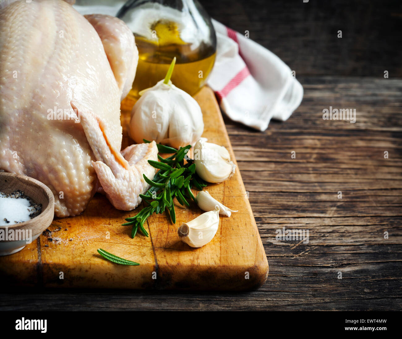 Raw chicken. Preparation for baking garlic chicken Stock Photo - Alamy