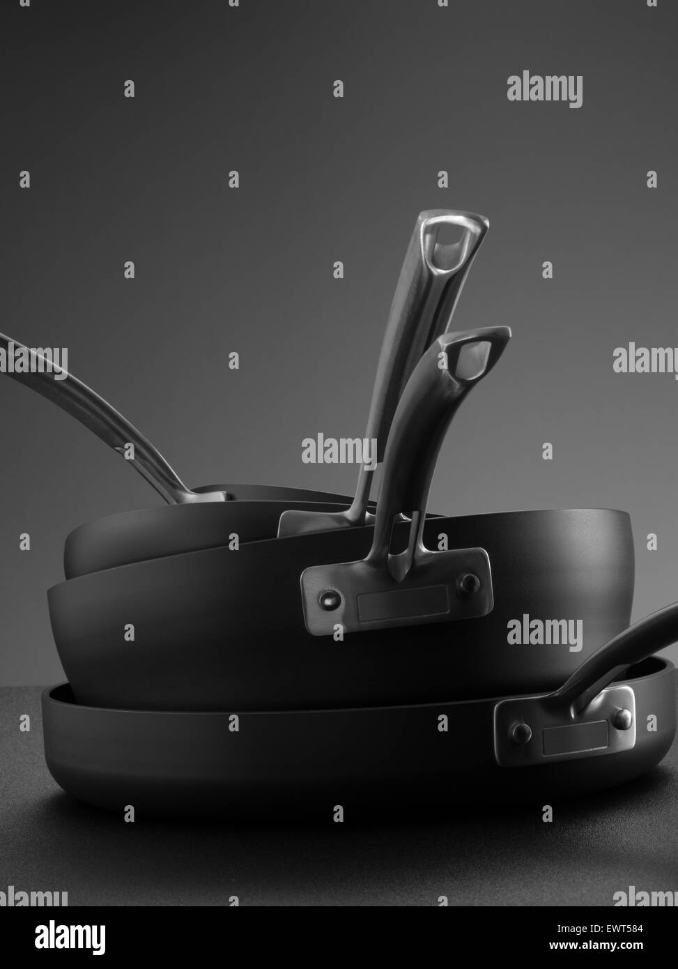close up view of nice cookware set on grey back Stock Photo - Alamy