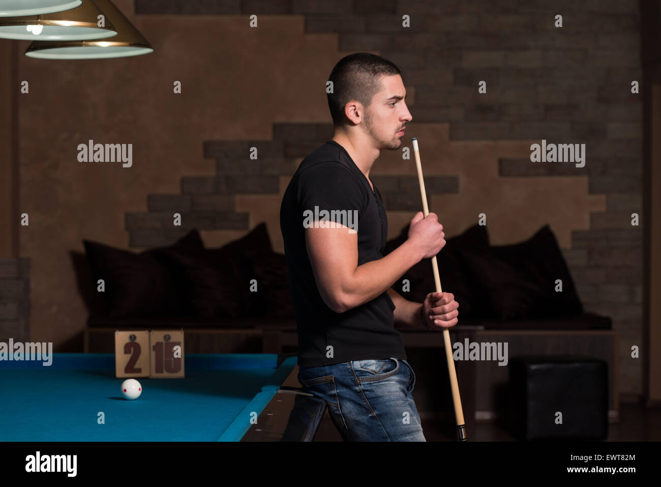 Young Man Looking Confused Lost His Billiard Game Stock Photo - Alamy