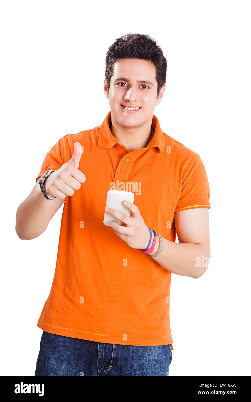 1 indian man Dialing Cell Phone and thumbs up showing Stock Photo - Alamy