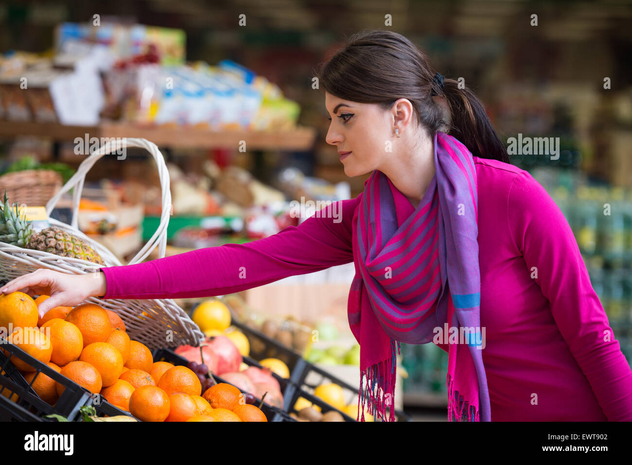 Beautiful Young Woman Shopping For Fruits And Vegetables In Produce ...