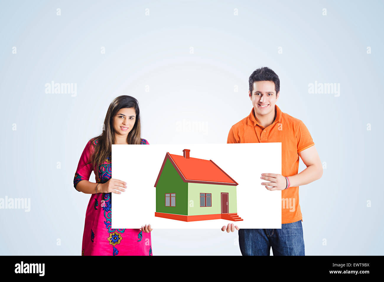 2 indian Married Couple showing Message Board Stock Photo - Alamy