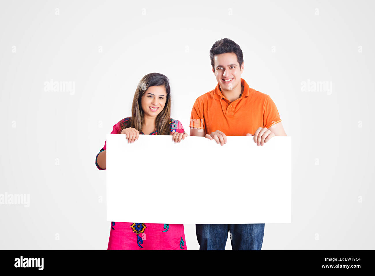 2 indian Married Couple showing Message Board Stock Photo - Alamy