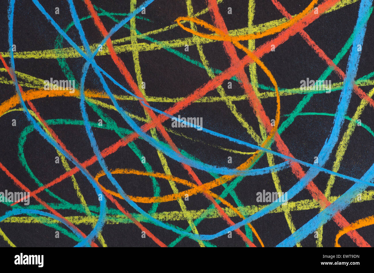 multicolored scribbles on black paper background Stock Photo - Alamy