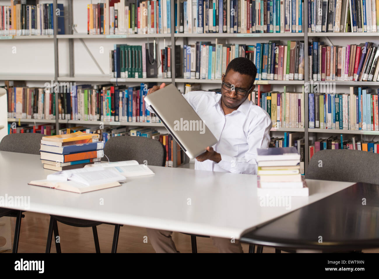 Student Throwing Desk