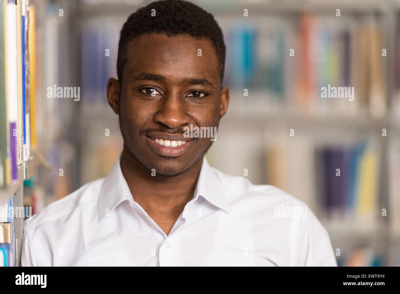 Black man studying in library hi-res stock photography and images - Alamy