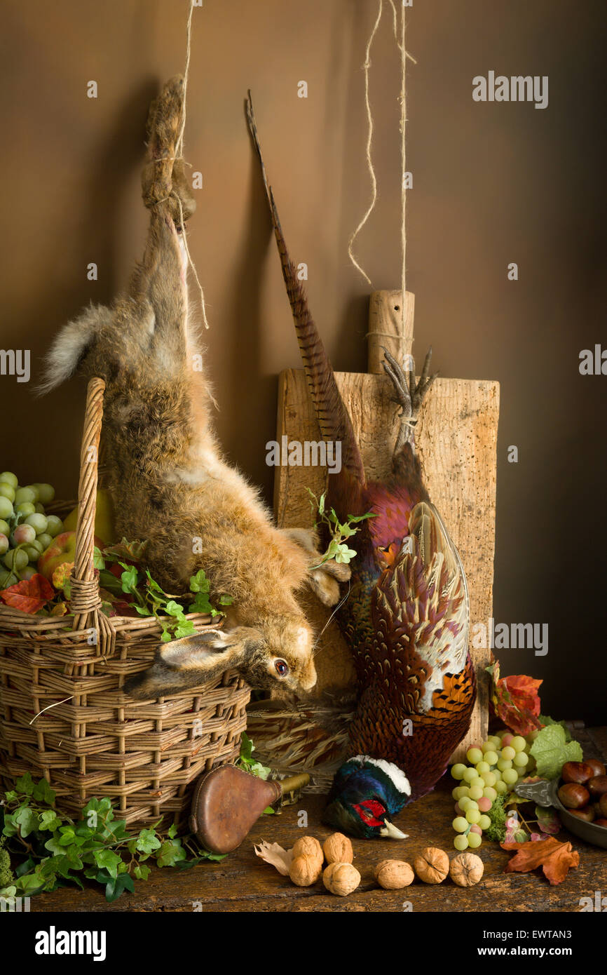 Autumn still life with hunting products, pheasant and hare Stock Photo ...