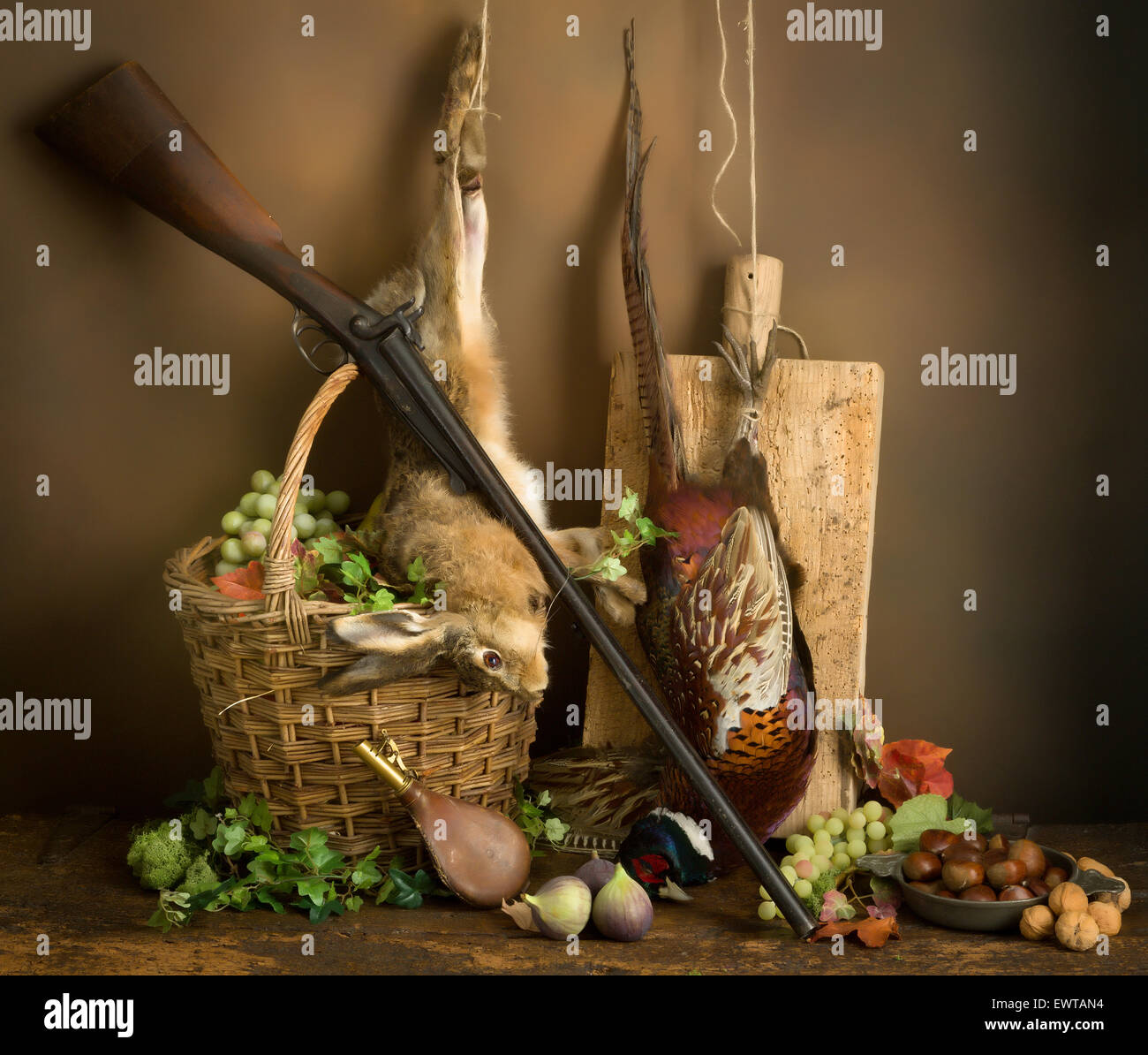 Autumn still life with hunting rifle, pheasant and hare Stock Photo - Alamy
