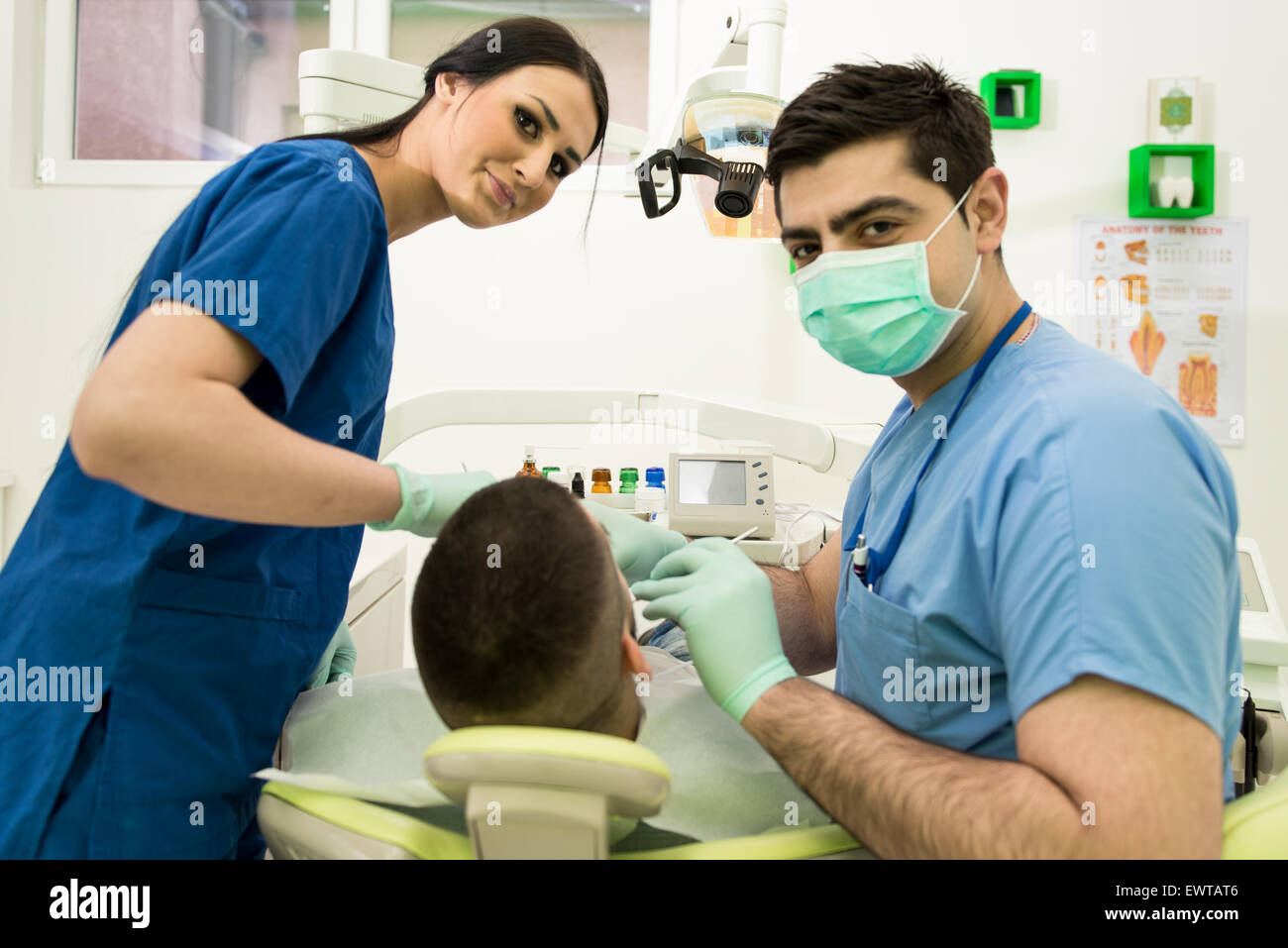 Surgery At The Dentist Office - Doctor Is Working On The Patients Mouth ...