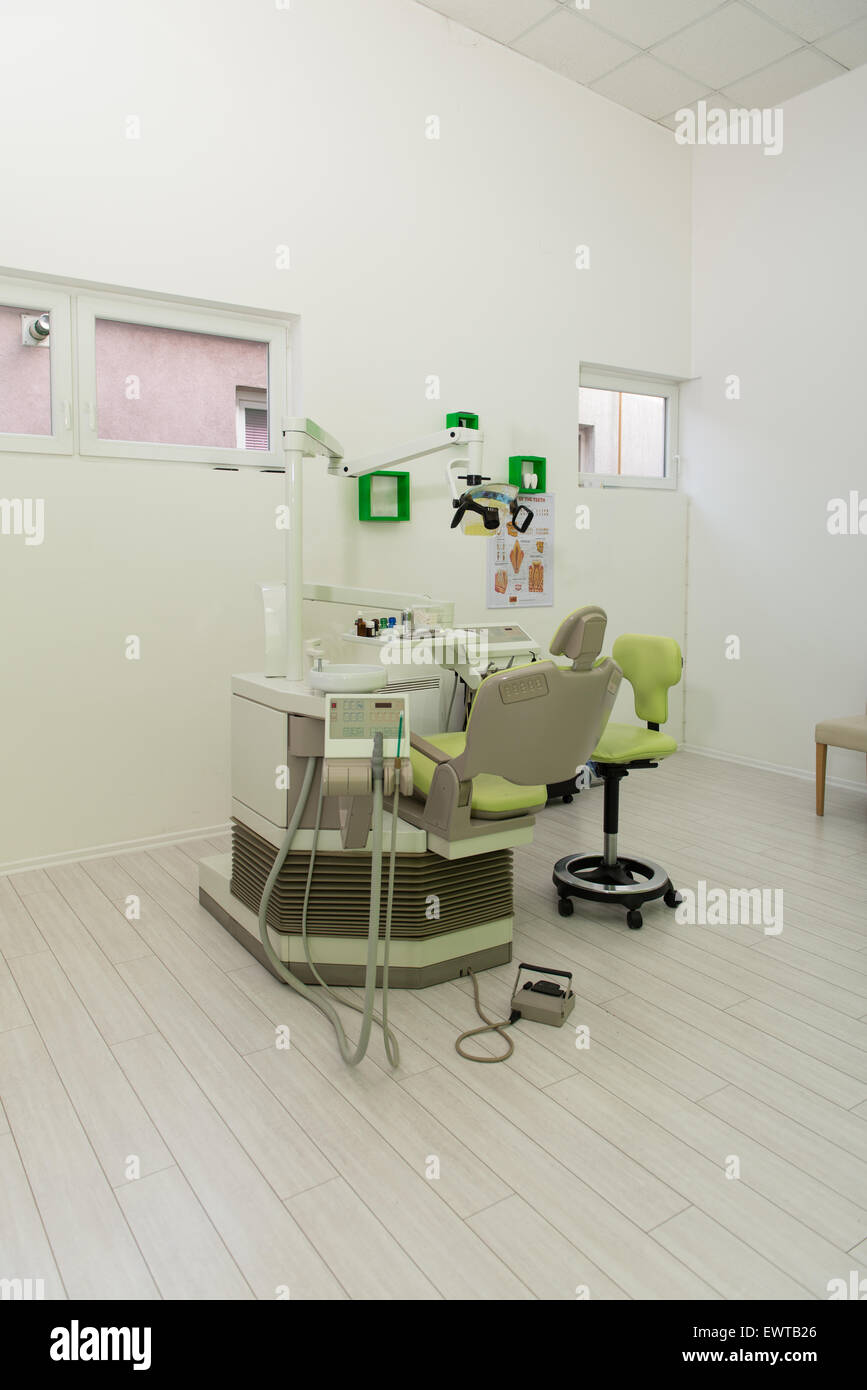 Dental Chair With Equipment In The Dental Office Stock Photo - Alamy