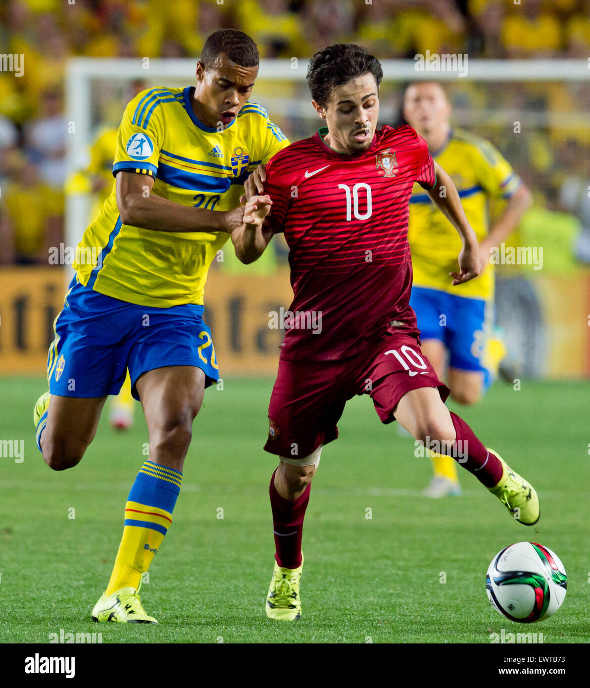 Prague, Czech Republic. 30th June, 2015. Robin Quaison of Sweden (left ...