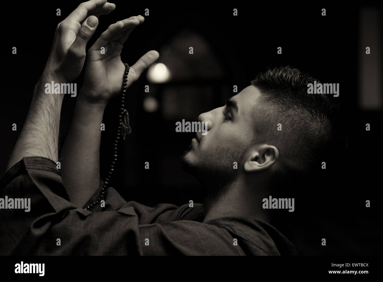 White muslim man praying in hi-res stock photography and images - Alamy