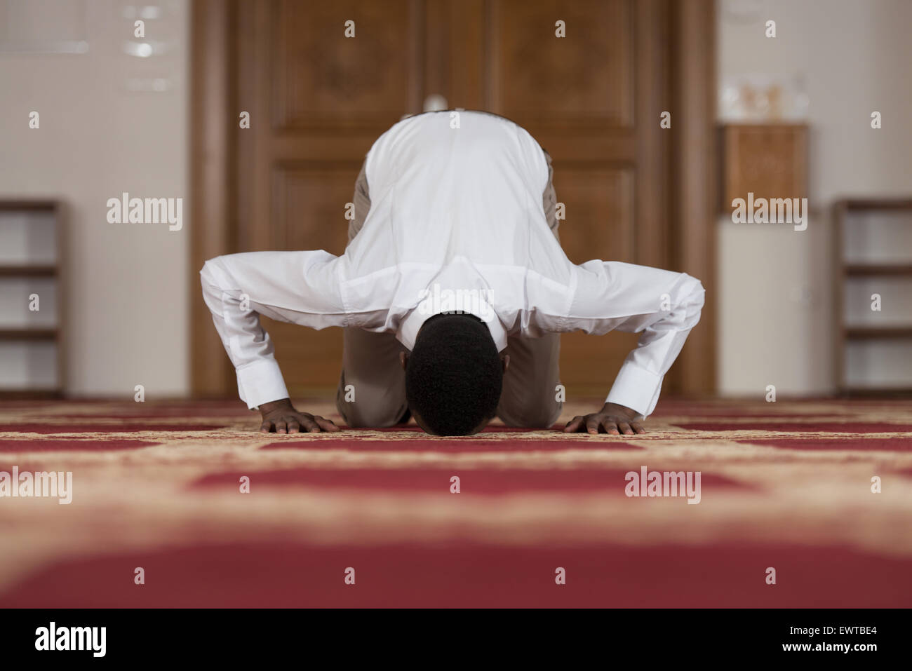Black African Muslim Man Is Praying In The Mosque Stock Photo - Alamy