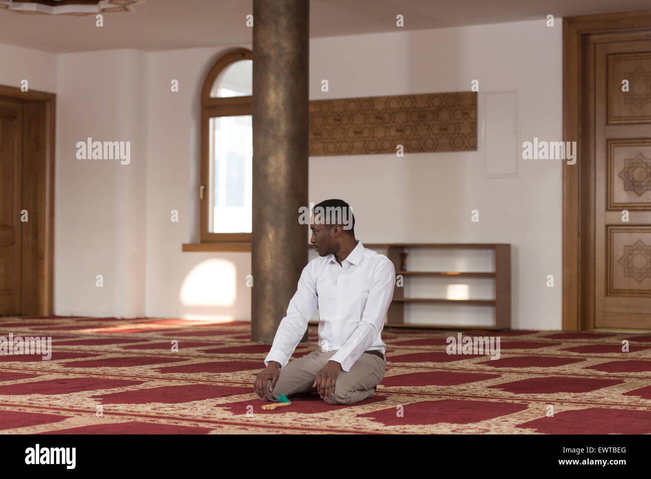 Black African Muslim Man Is Praying In The Mosque Stock Photo - Alamy