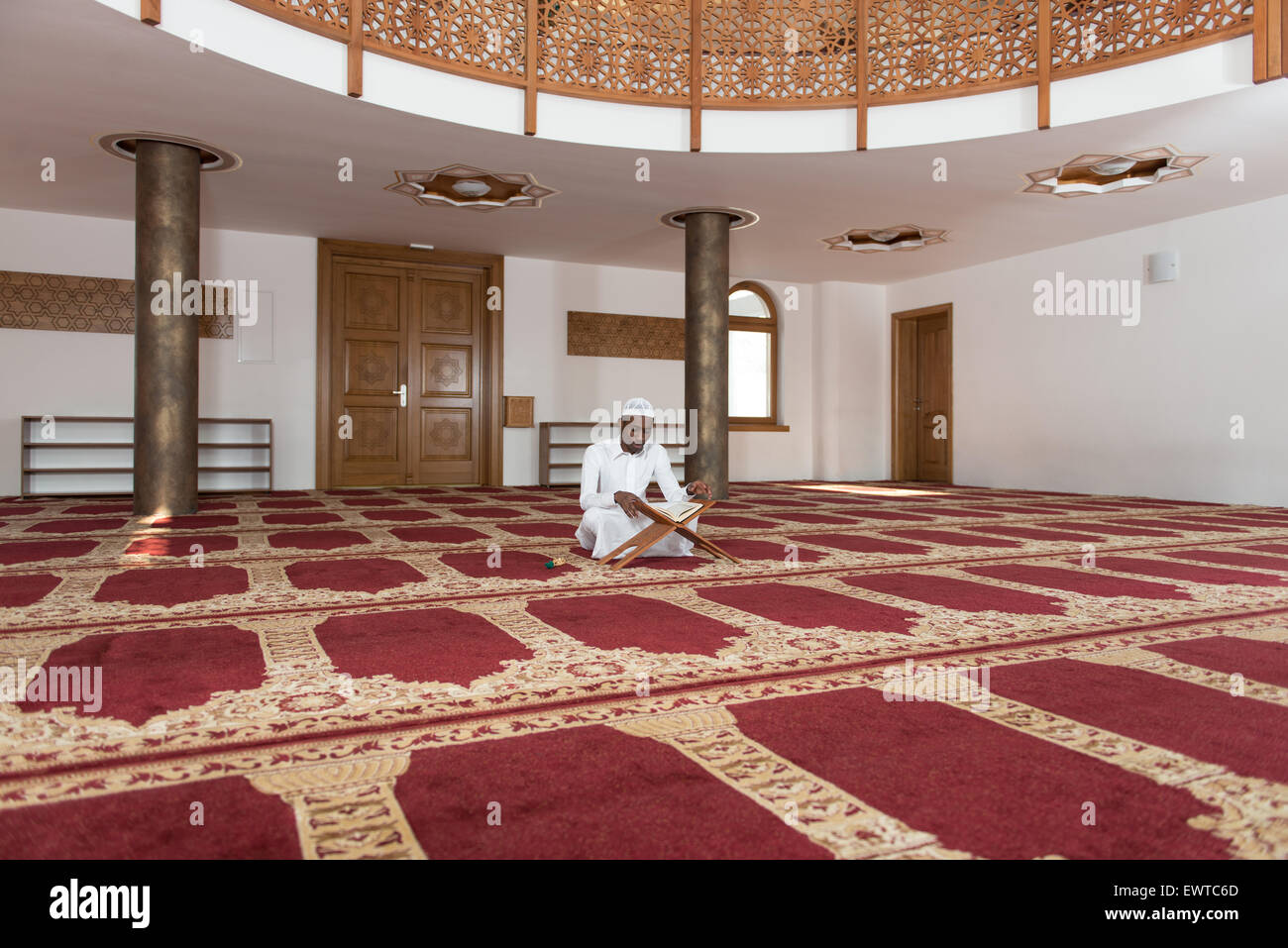 Black African Muslim Man Reading Holy Islamic Book Koran Stock Photo ...