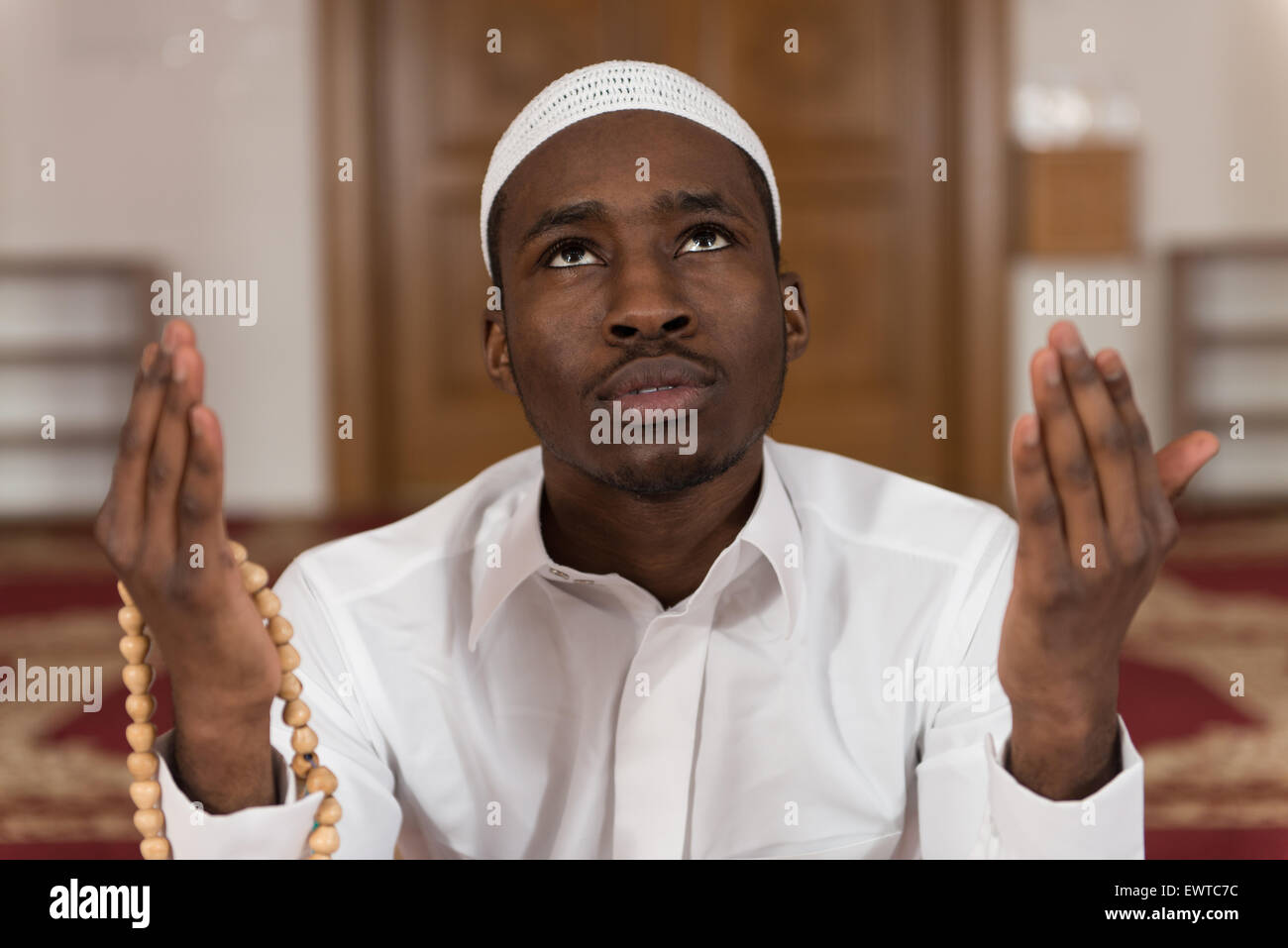Black man reading quran african hi-res stock photography and images - Alamy