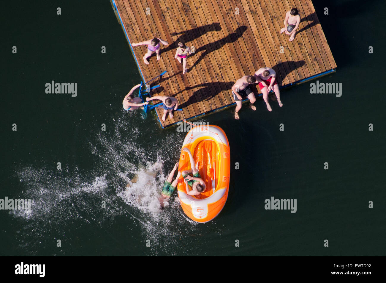 Sarstedt, Germany. 30th June, 2015. Children play on a wooden island ...