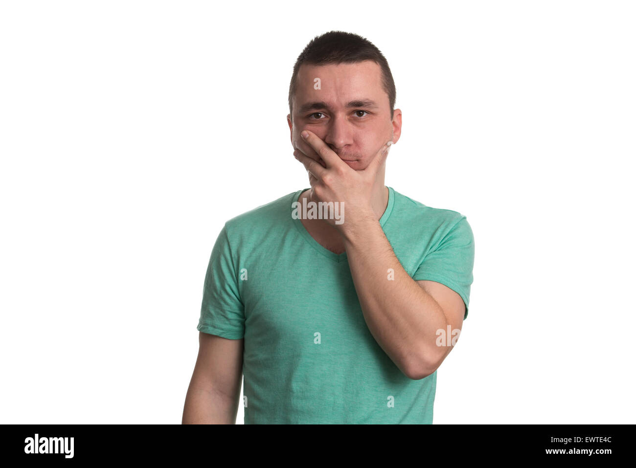 Portrait Of The Young Thinking Man Looks Up With Hand Near Face ...