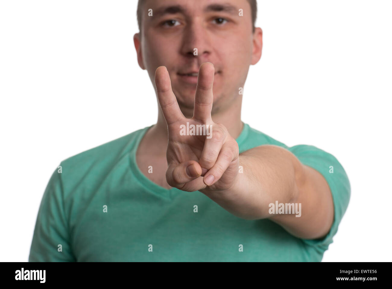 Portrait Of Young Man Giving Peace Sign - Isolated On White Background ...