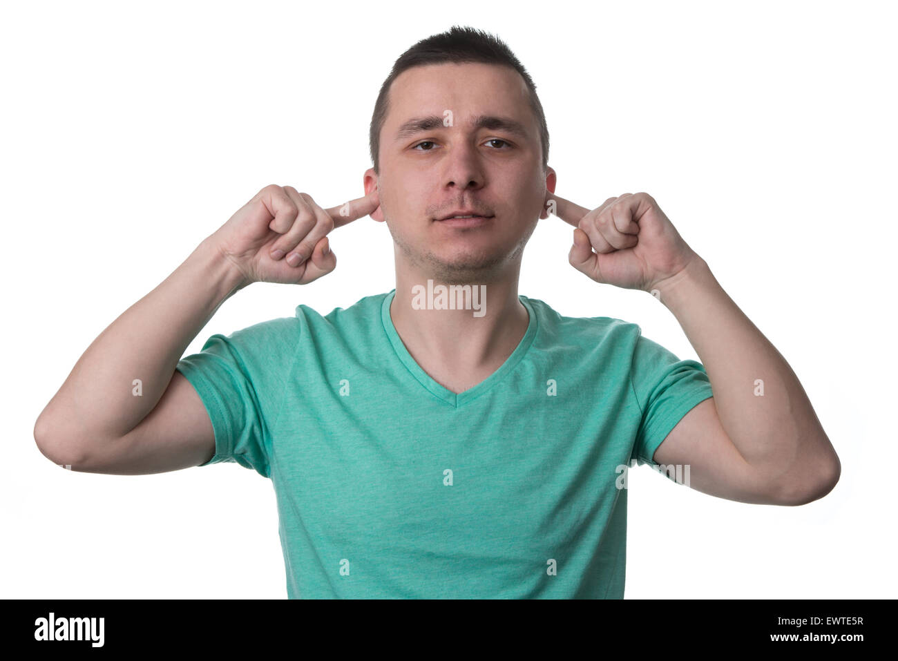 Handsome Guy Closing Ears With His Fingers - Isolated On White ...