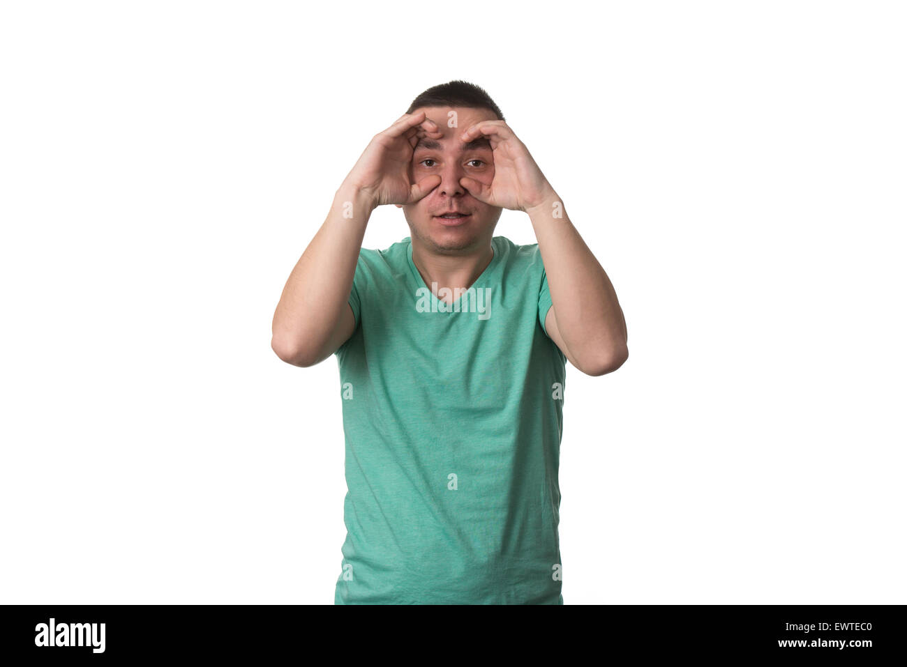 Man Using Hands Like Glasses - Isolated On White Background Stock Photo ...