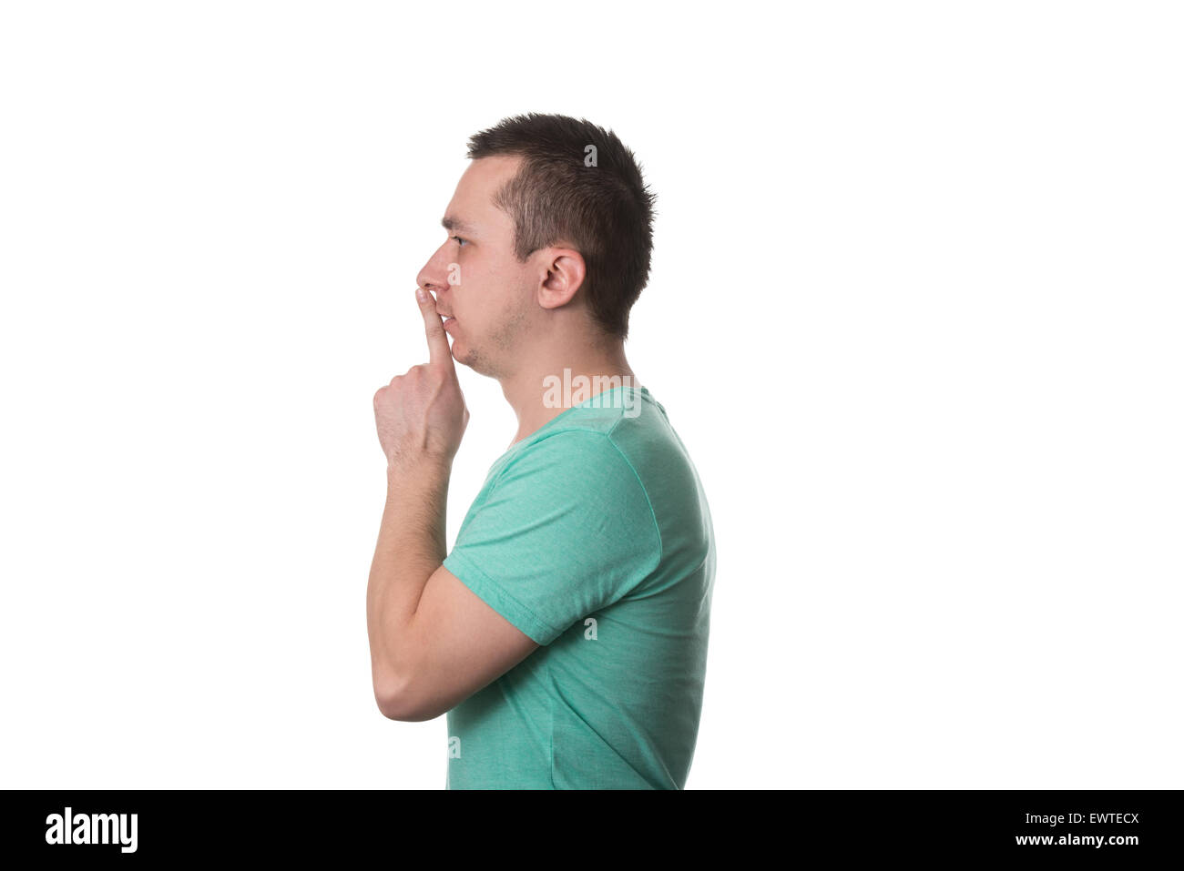 Portrait Of Young Handsome Man Quiet Gesture With Finger - Isolated On ...
