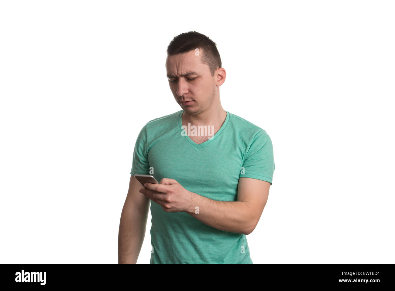 Young Man Looking At His Smart Phone While Text Messaging - Isolated On ...