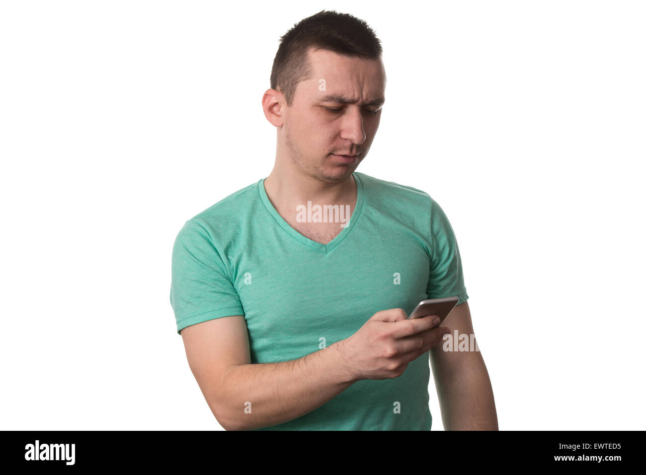 Young Man Looking At His Smart Phone While Text Messaging - Isolated On ...