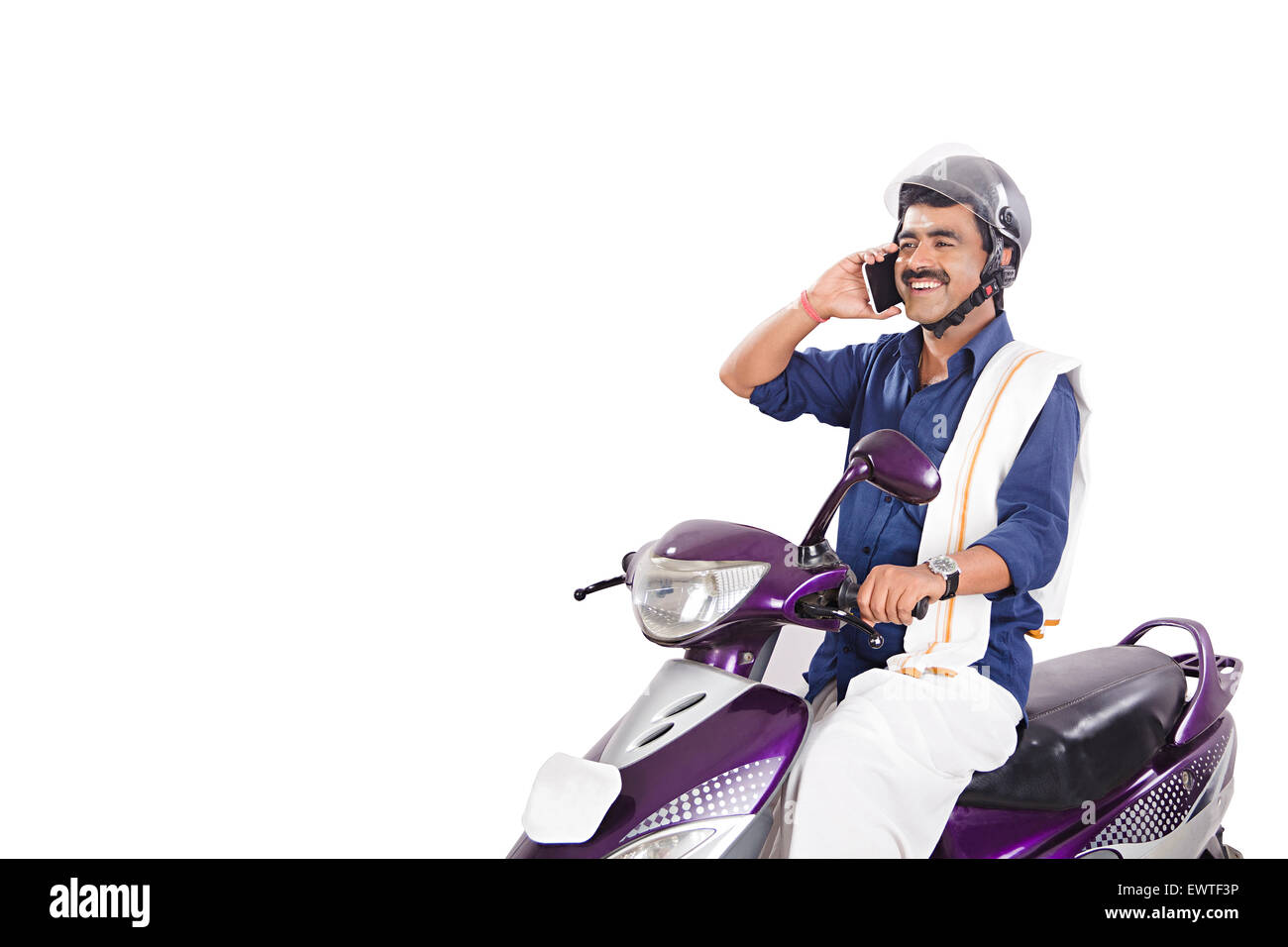 1 South Indian man Riding Scooty and talking Cell Phone Stock Photo - Alamy
