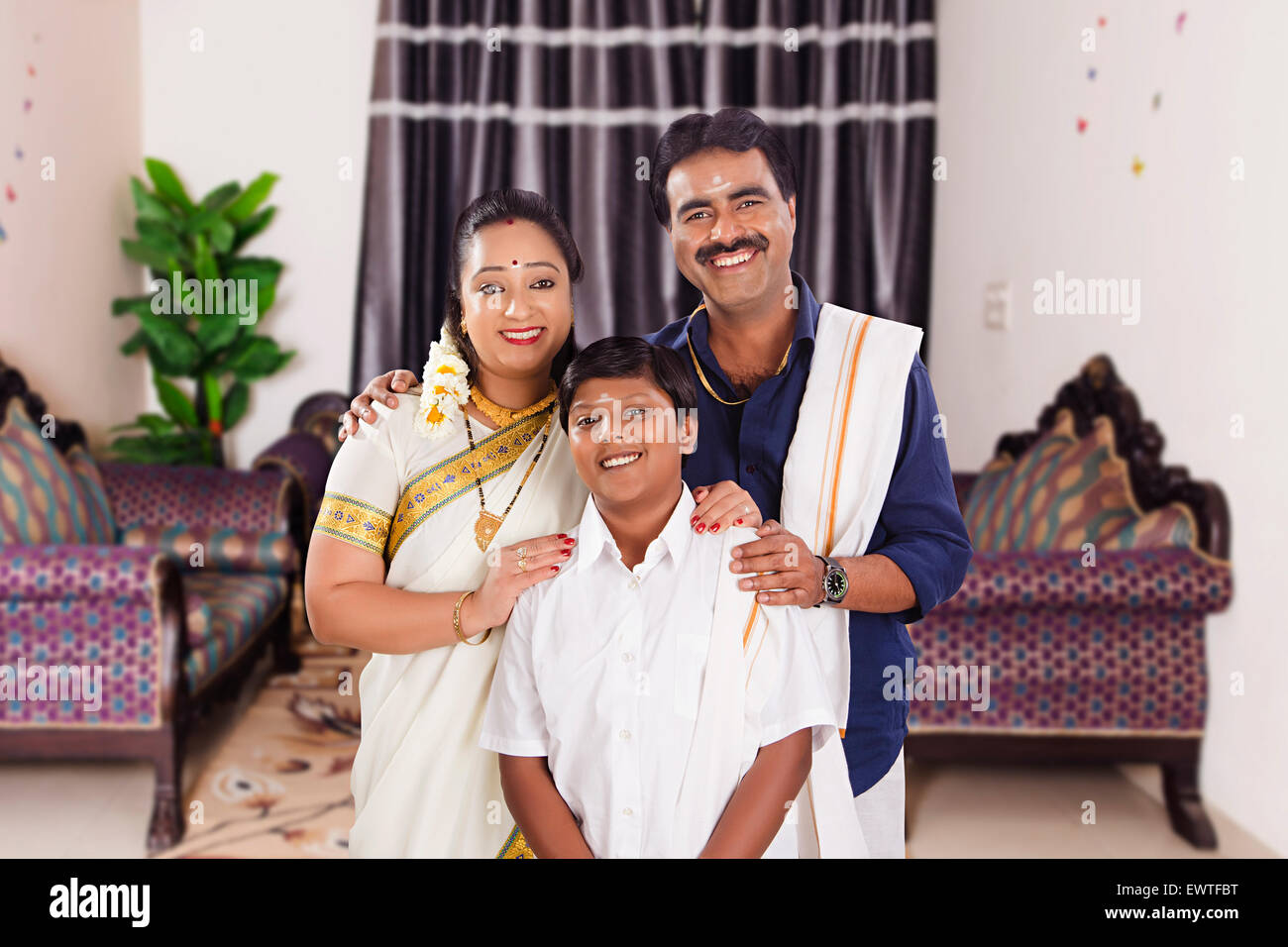 South Indian Parents and son home enjoy Stock Photo - Alamy