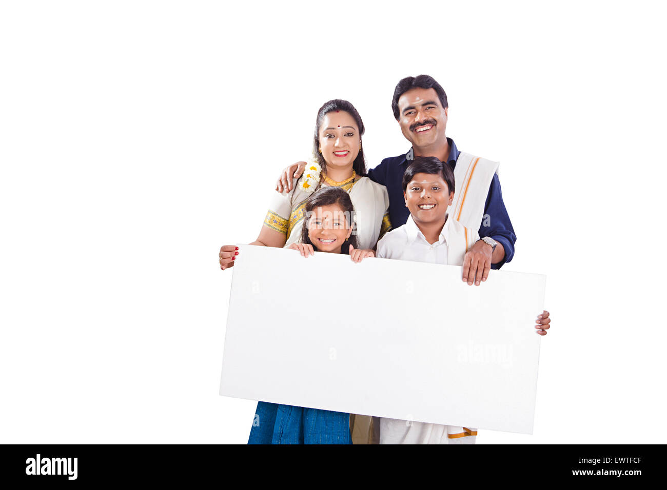 South Indian Parents and kids showing Message Board Stock Photo - Alamy