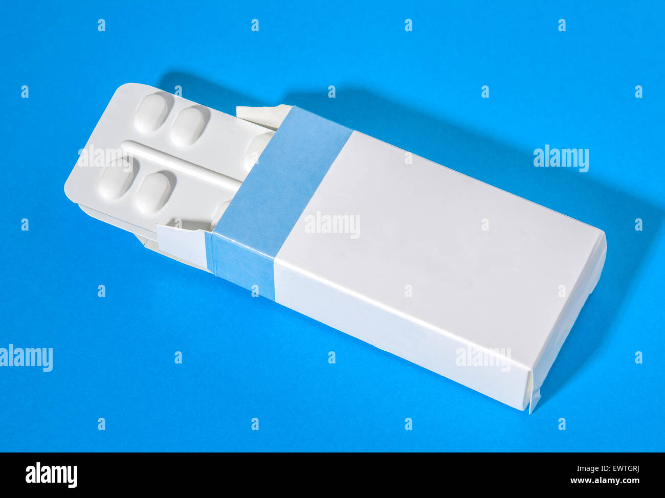 Two packages of pills inside a blue and white box Stock Photo - Alamy