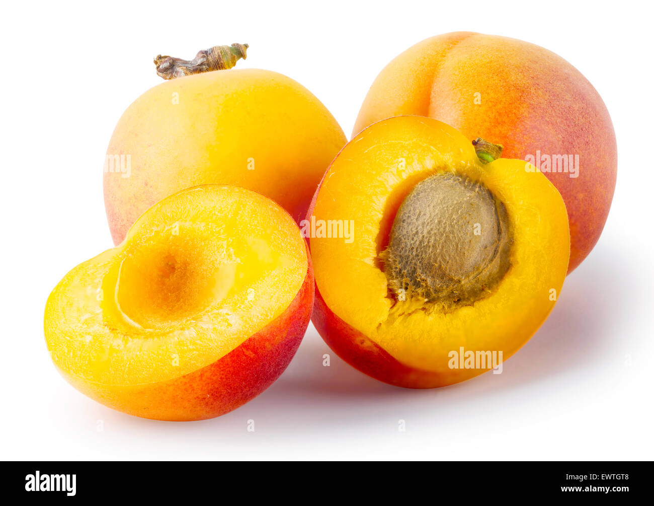 Whole and cut apricots with leaves isolated on white background Stock ...