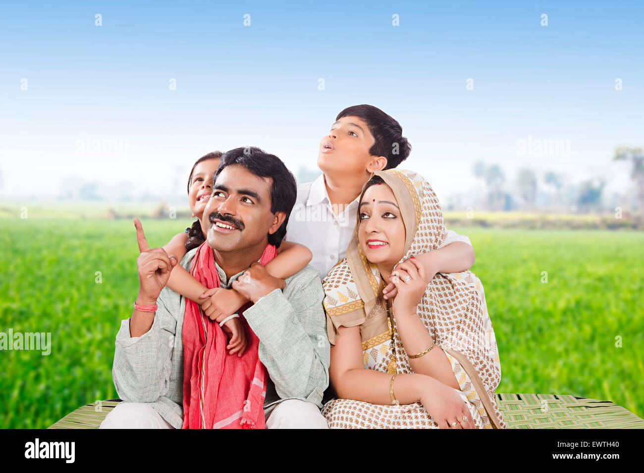 Indian parents kids sitting enjoy hi-res stock photography and images ...