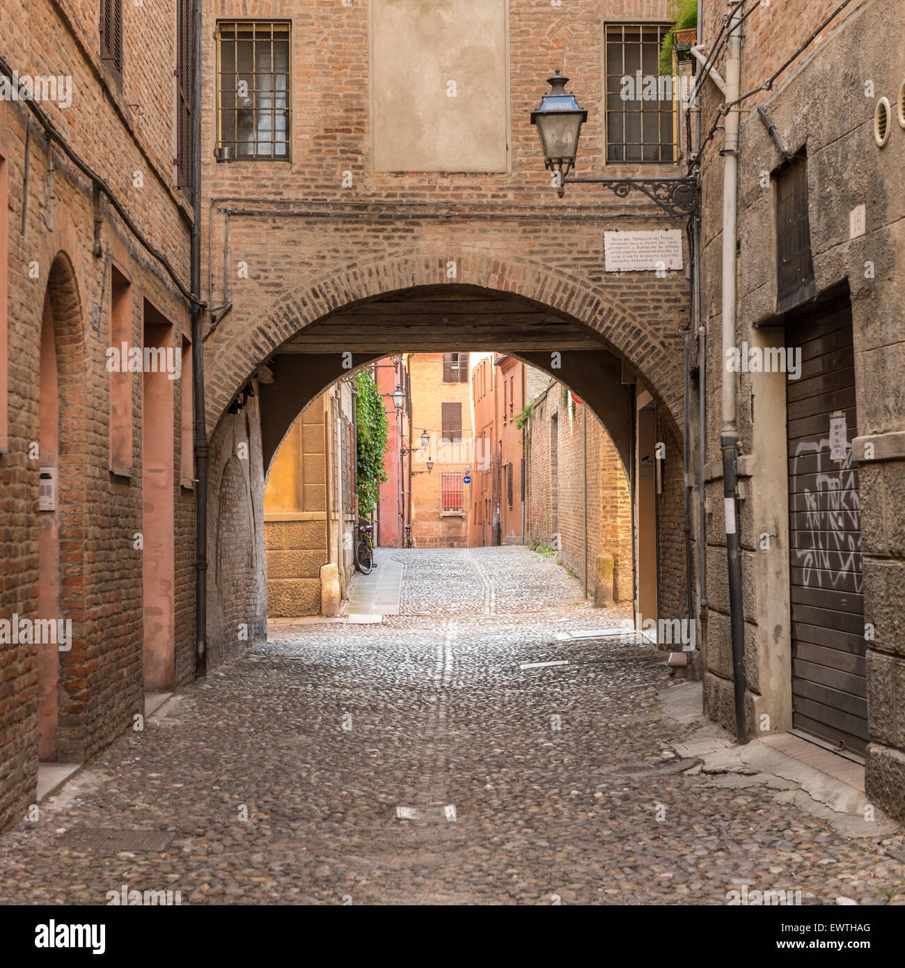 Ancient medieval street in the downtown of Ferrara city Stock Photo - Alamy