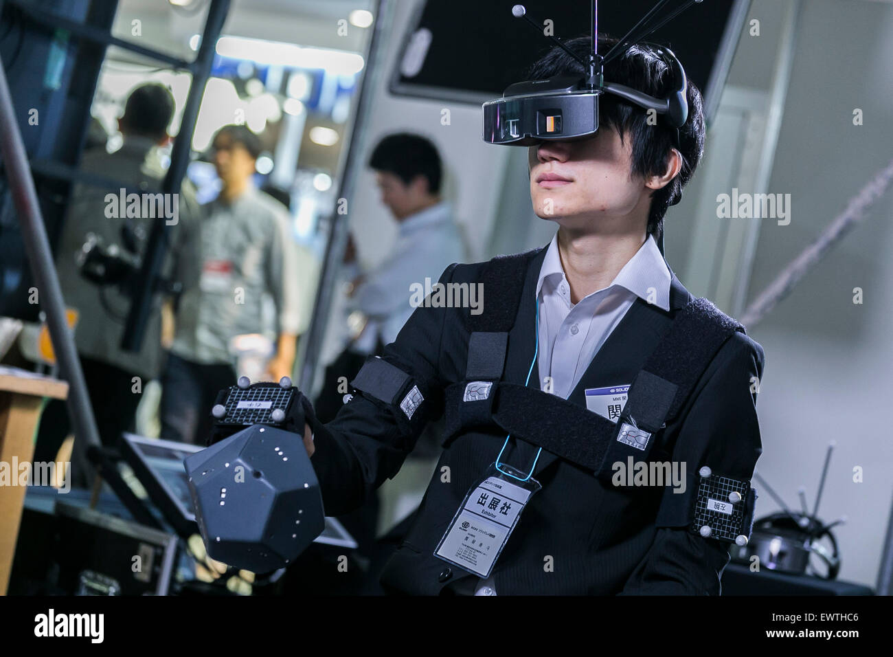 Tokyo, Japan. 1st July, 2015. A man tests a ''MREAL'' virtual reality ...