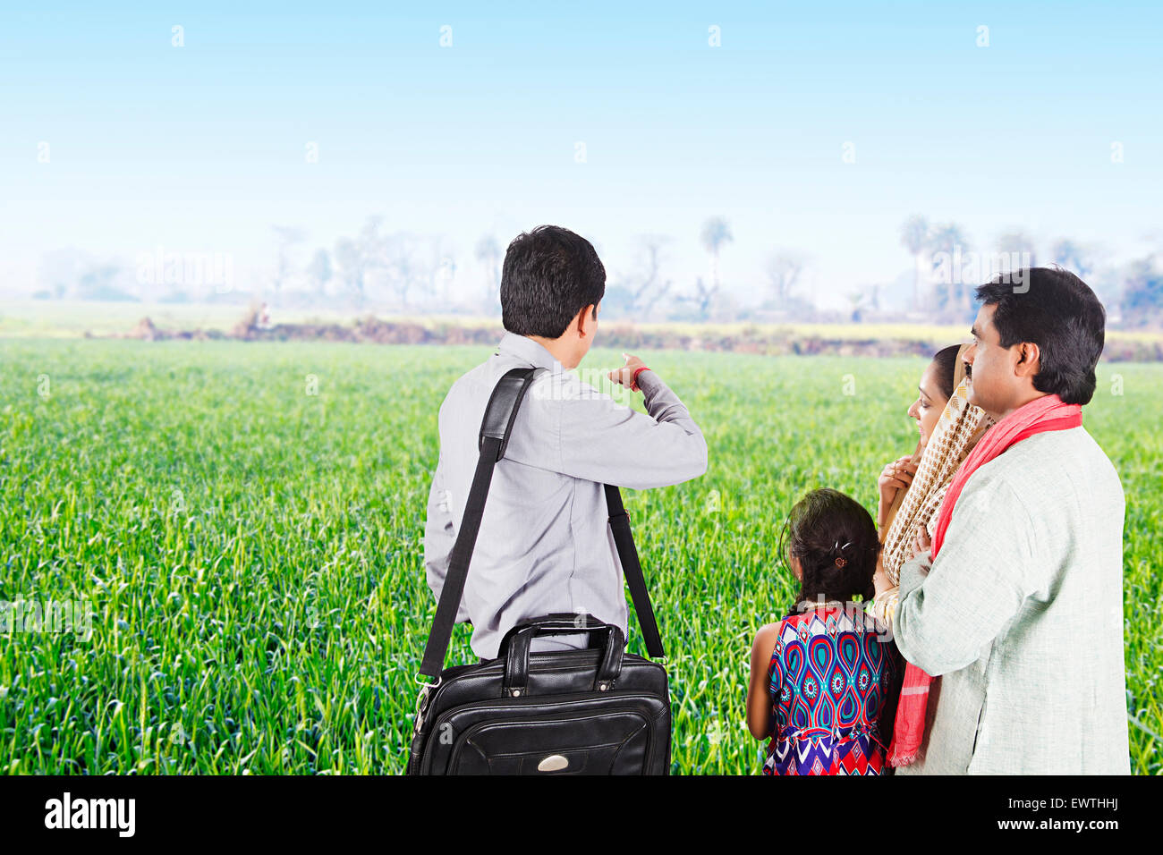 indian Rural Parents and Salesman farm Discussion Stock Photo - Alamy