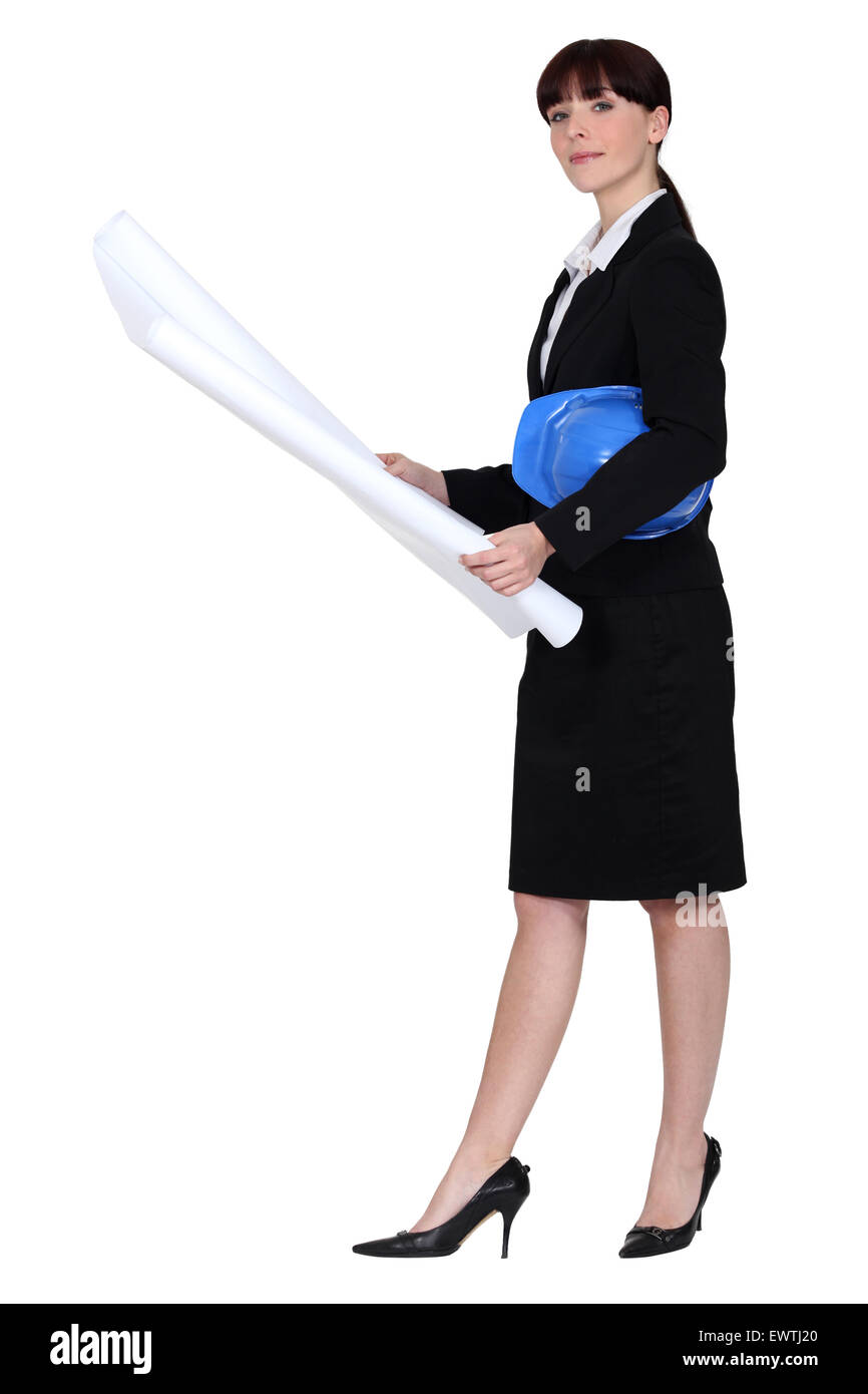 Female architect holding plans Stock Photo - Alamy Female architect holding plans Stock Photo - Alamy
