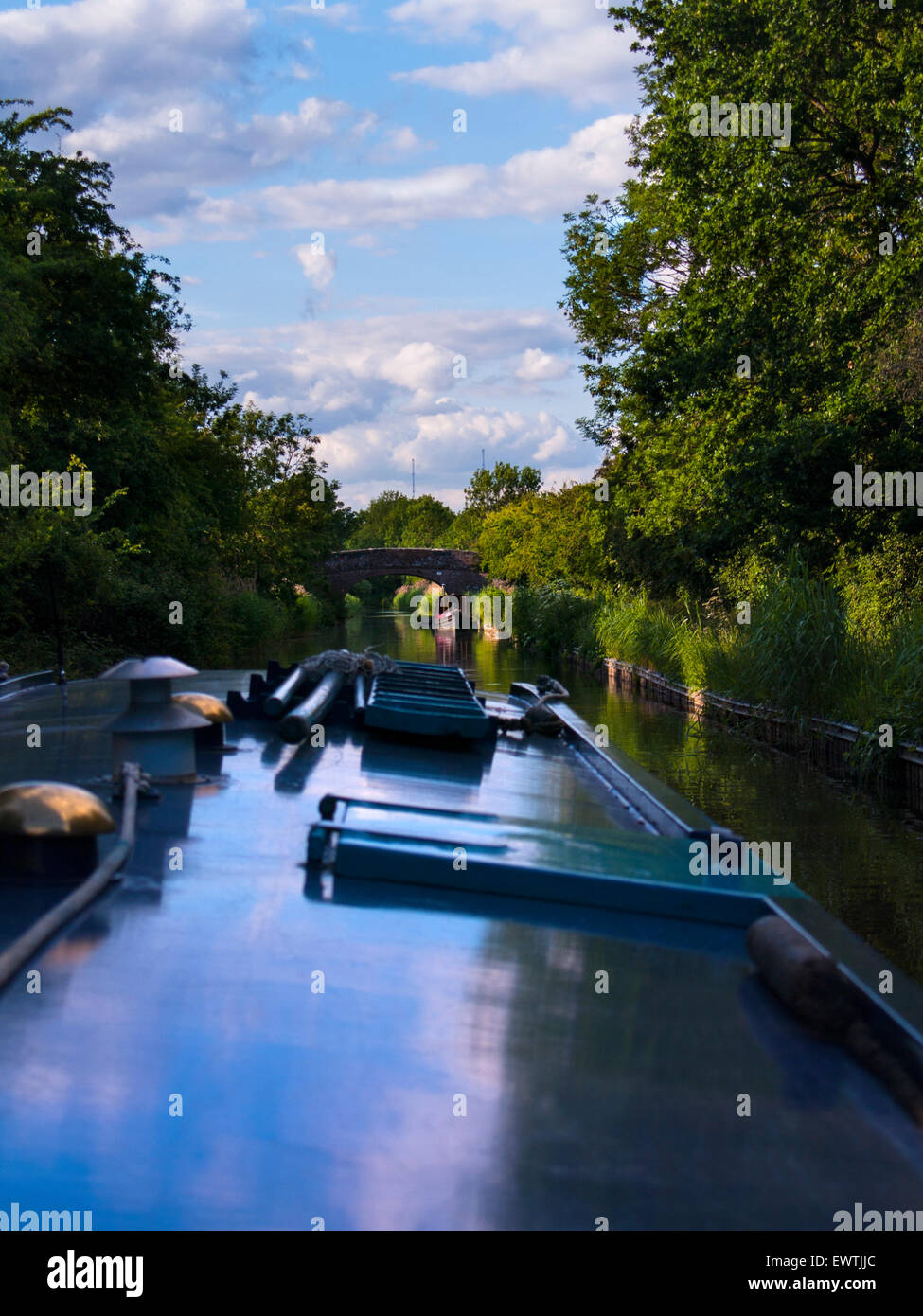 View from back/rear of canal boat - countryside, canal and bridge Stock ...