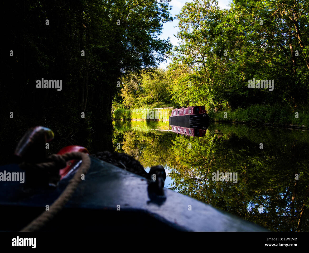 View from front of canal boat, boat coming towards Stock Photo - Alamy