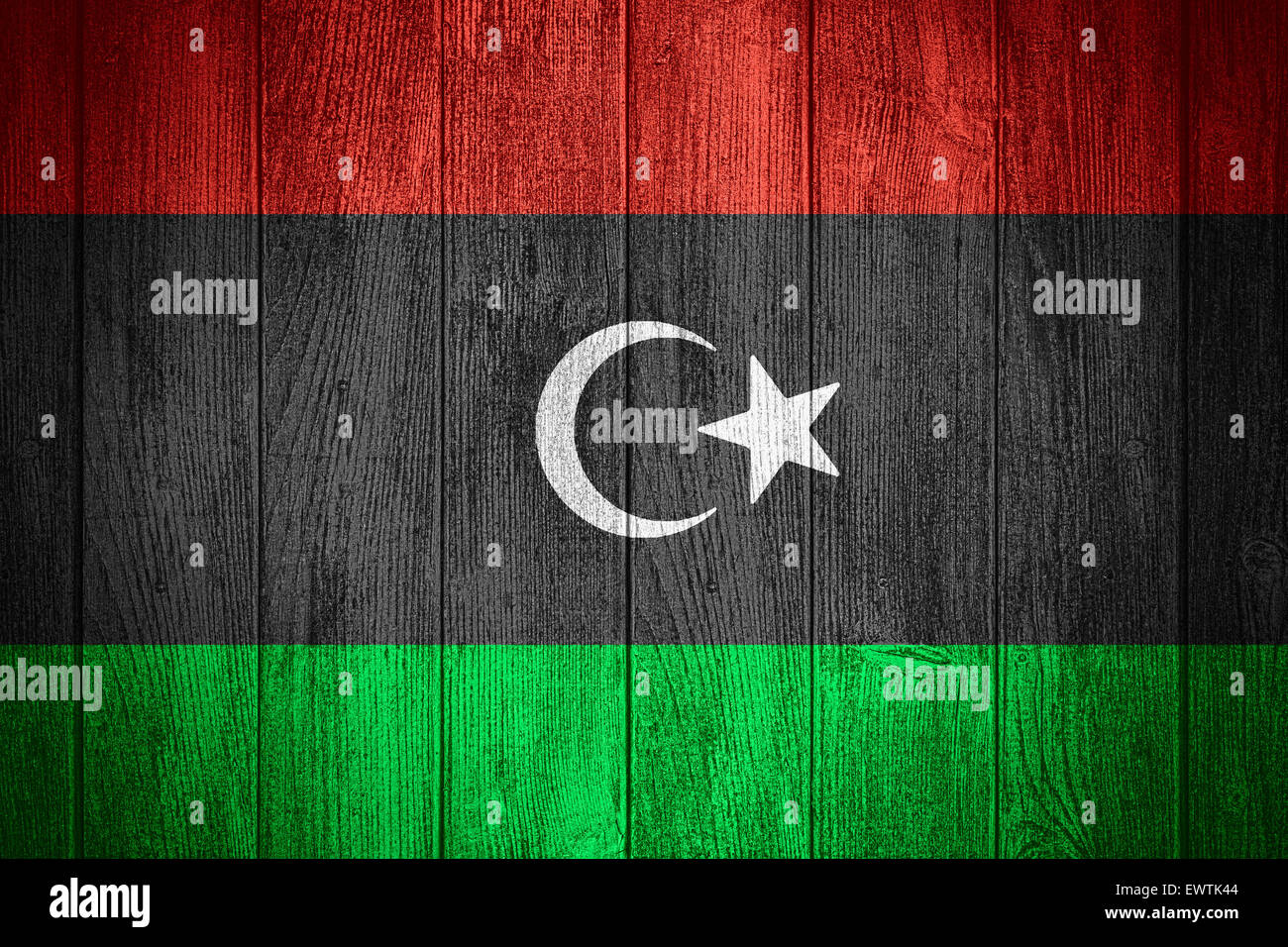 Libya flag or Libyan banner on wooden boards background Stock Photo - Alamy