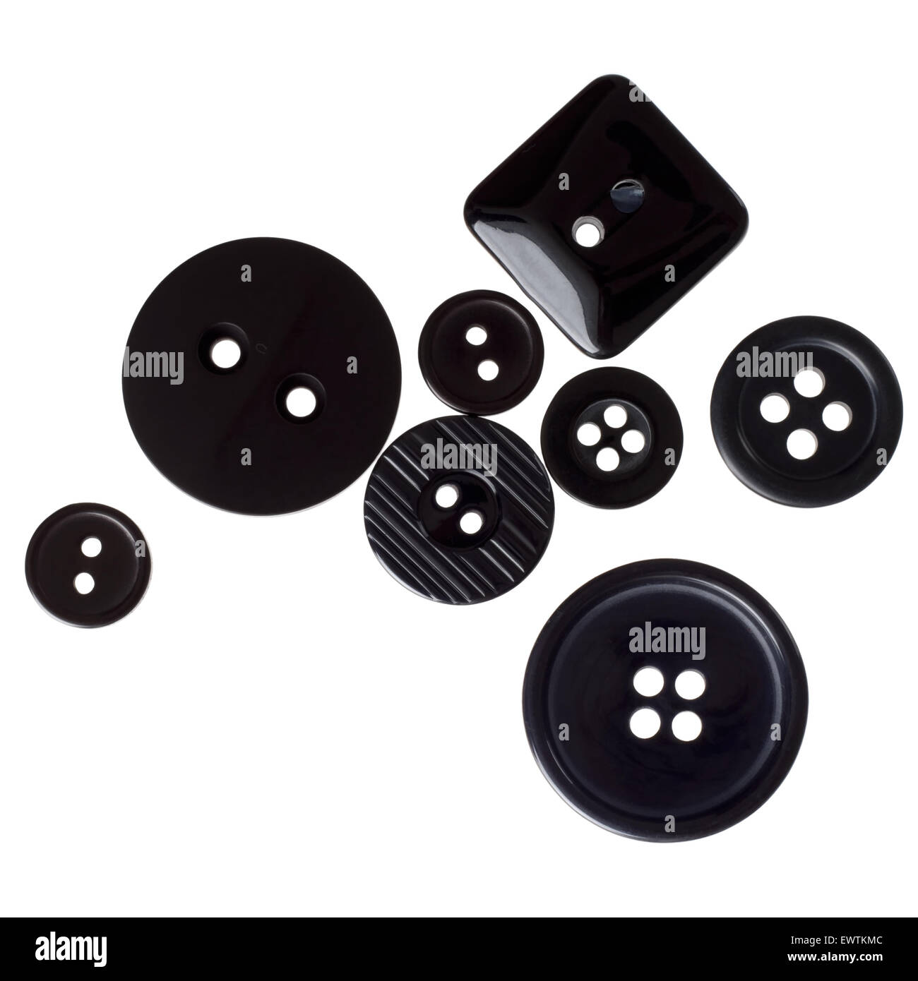 Assorted shiny black buttons isolated on white.Some quite old Stock ...