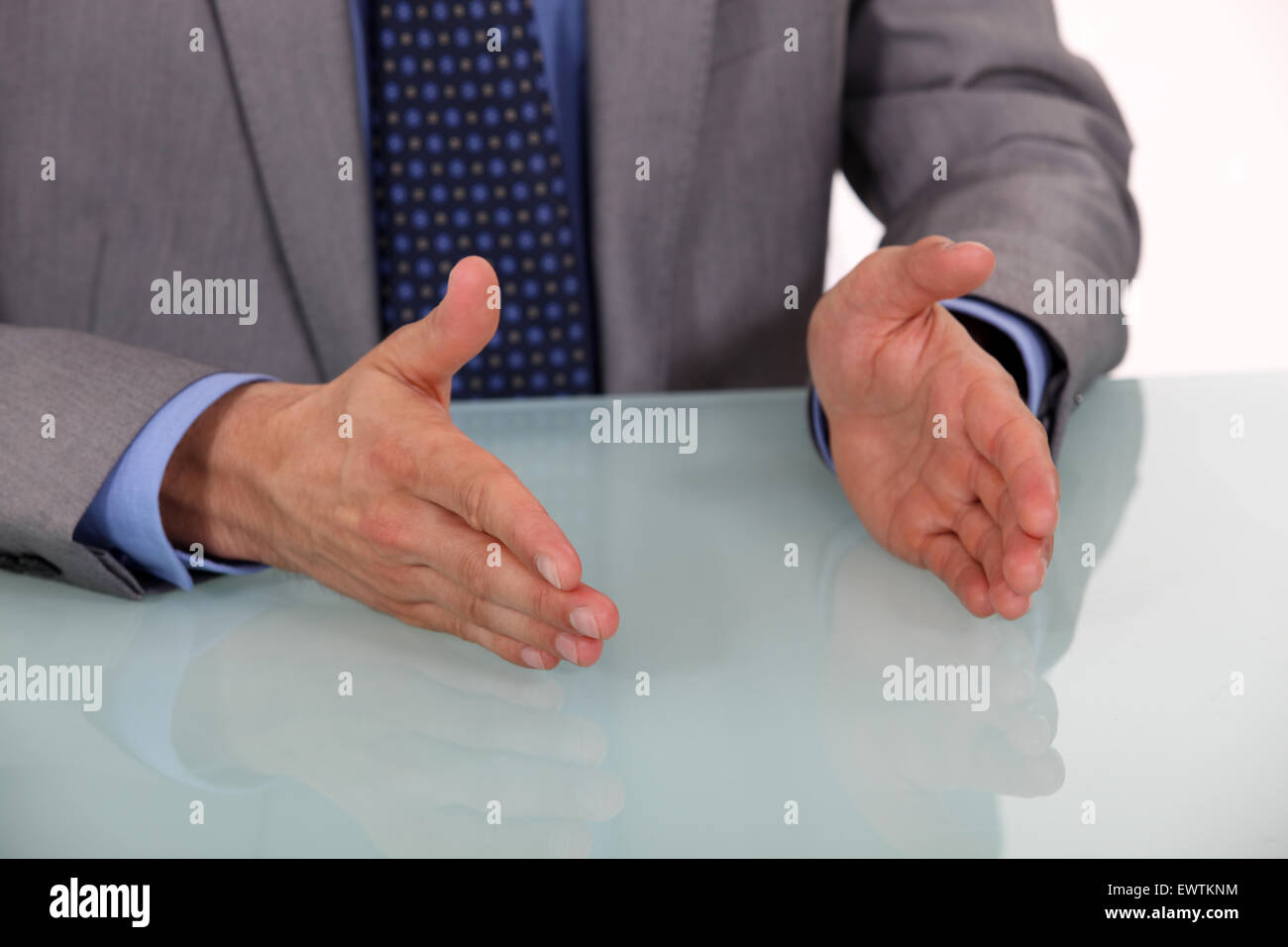 Businessman's hands on a desk Stock Photo - Alamy
