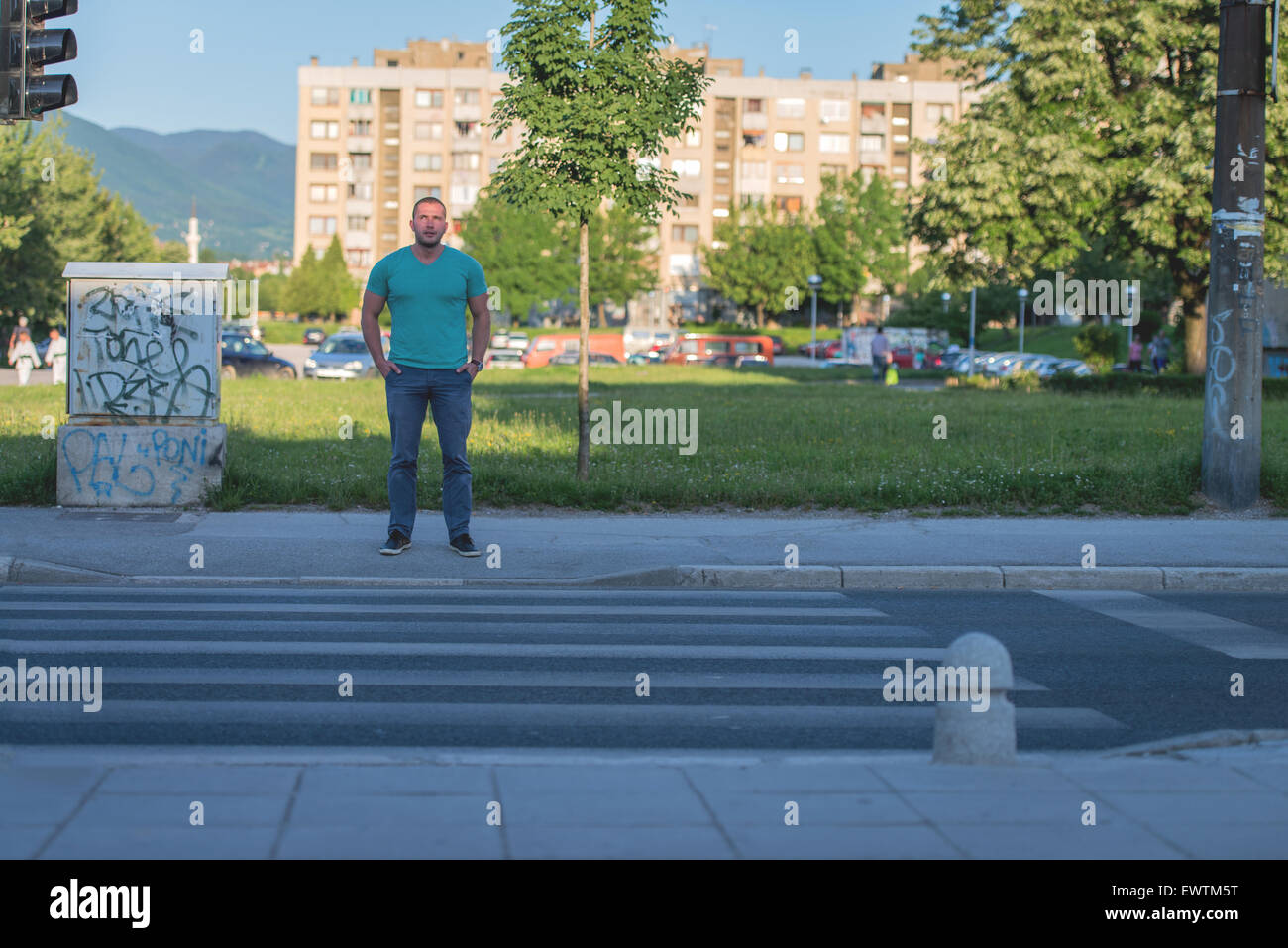 young man Waiting for green light Stock Photo - Alamy