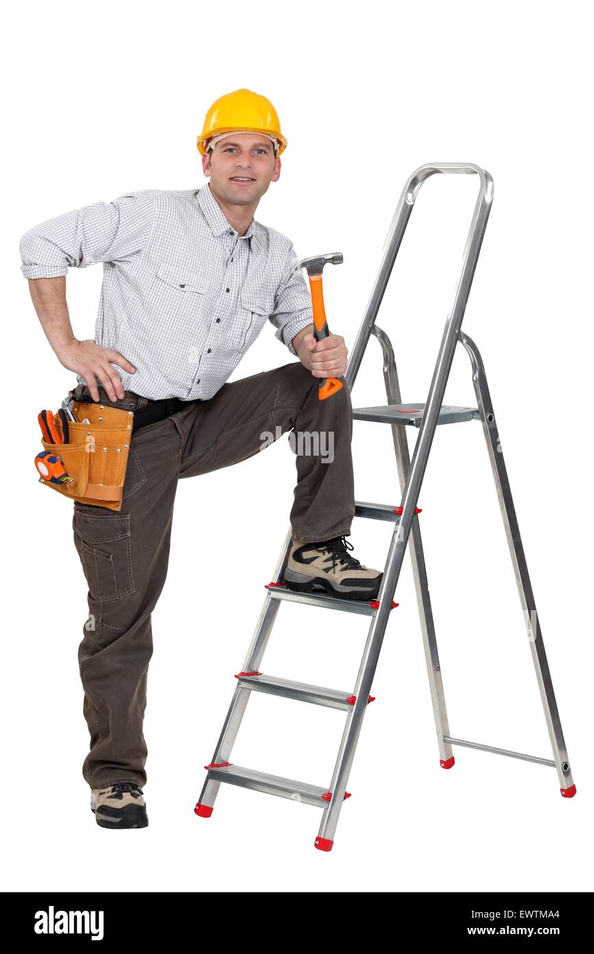 Carpenter resting on ladder Stock Photo - Alamy