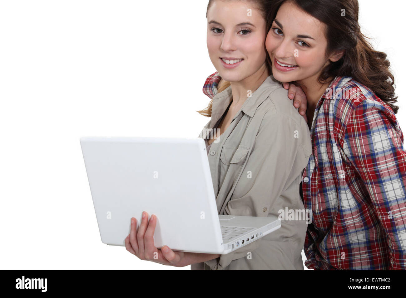 Students working together with laptop Stock Photo - Alamy