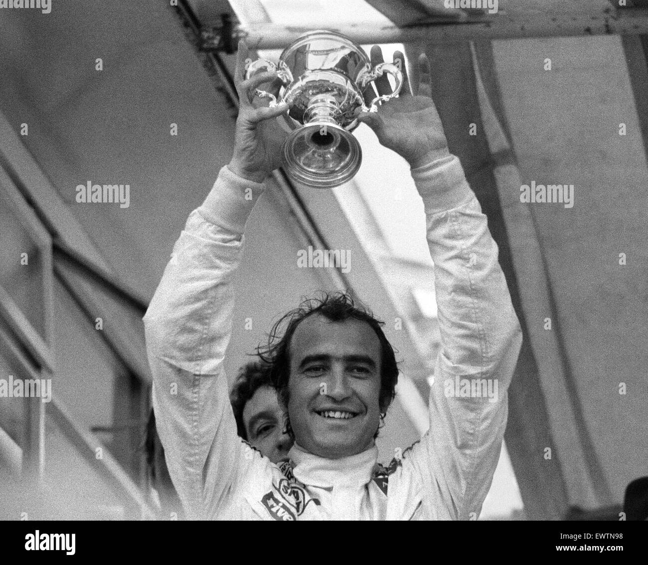 1971 Race of Champions at Brands Hatch. Winner Clay Regazzoni holds ...