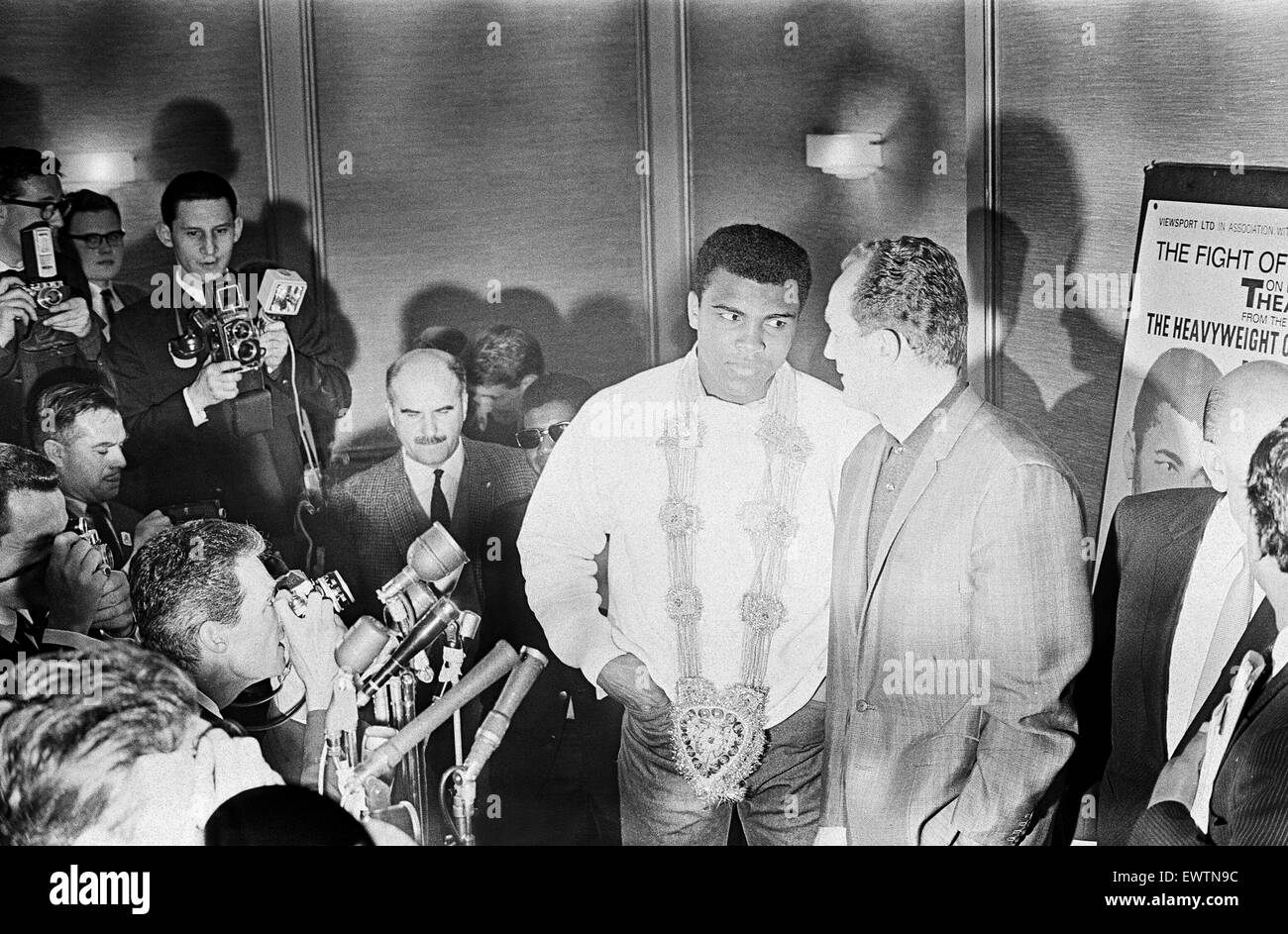 Cassius Clay and Henry Cooper promoting their second fight in London at ...