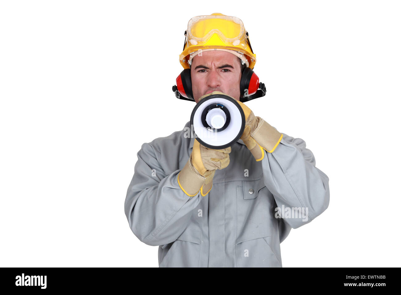 Construction worker with a loudspeaker Stock Photo - Alamy