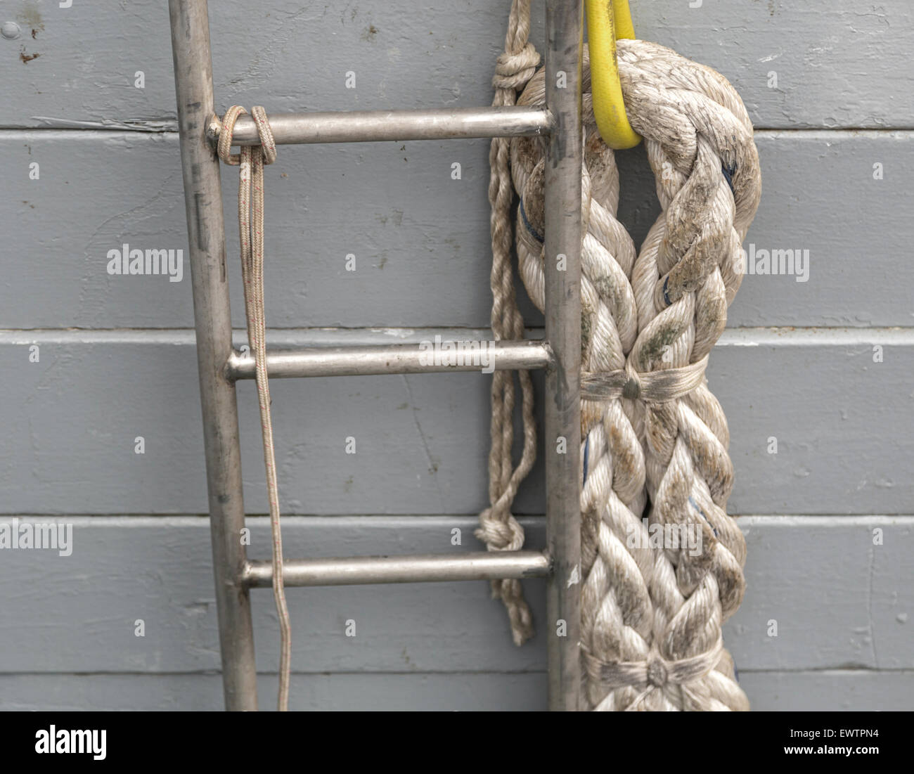Ropes and ladder, attached to a trawler, moored at Vissershaven ...